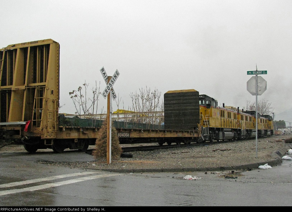 UPY 2714, 2718 & 2719 pulling a 1 car train out of Grove Lumber yard